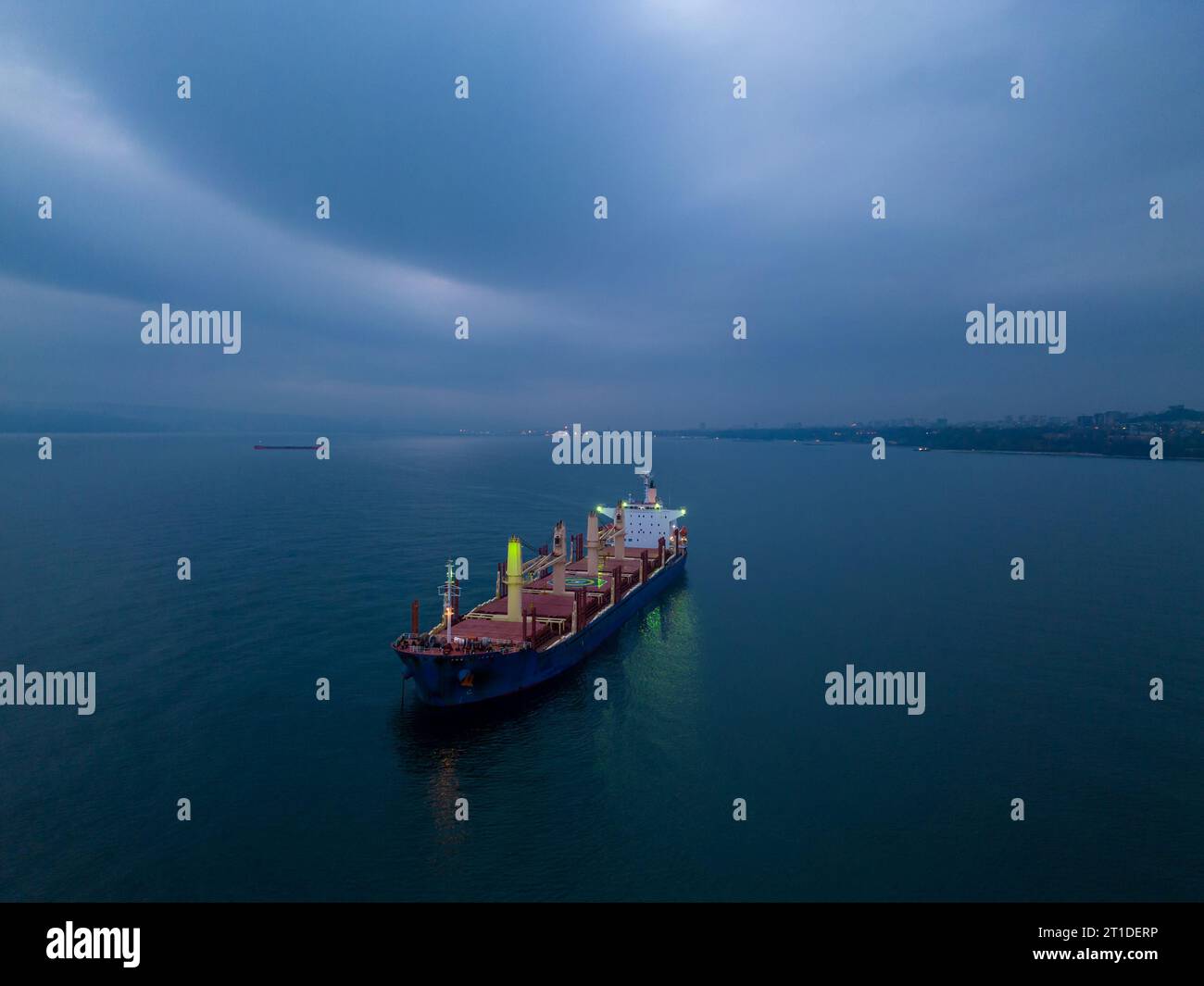 Aerial top view cargo bulk carrier ship on the sea at night Stock Photo ...