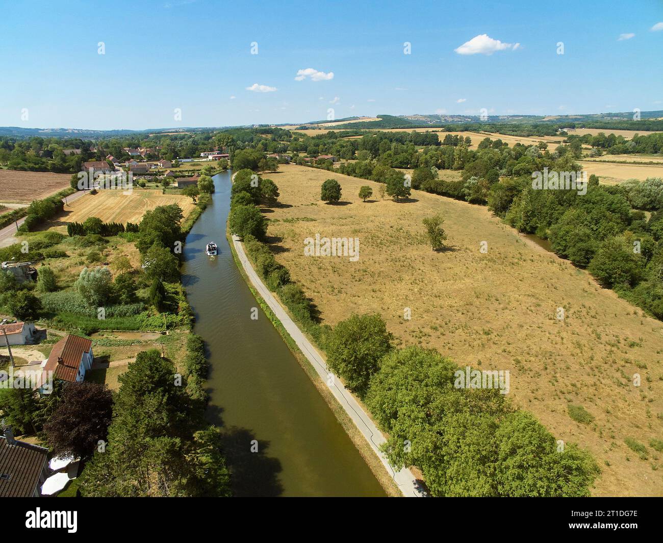 Tourist boat on the Canal du Centre in the area of Saint Gilles and ...