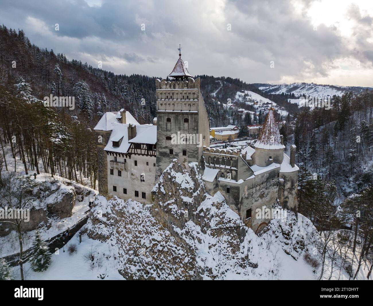 The snow covered medieval Castle of Bran, known for the castle of ...