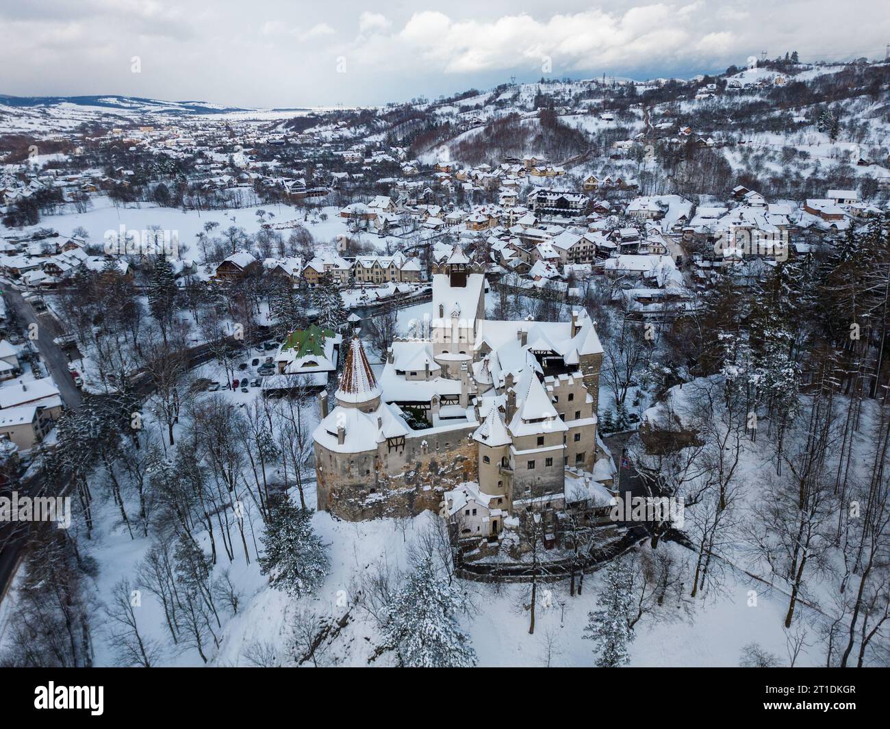 The snow covered medieval Castle of Bran, known for the castle of ...
