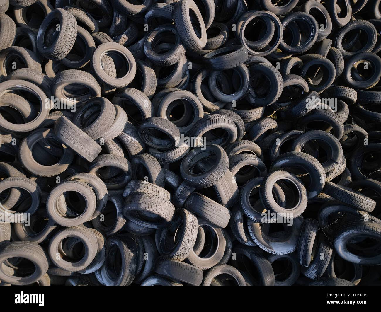 Aerial top down view of old tires. Many car and truck tires on dump ...