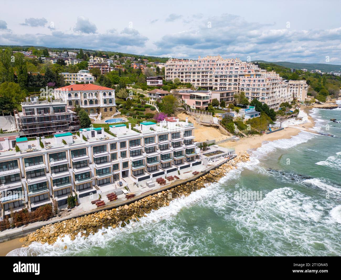 A stunning view of an exclusive residential complex nestled by the sea ...