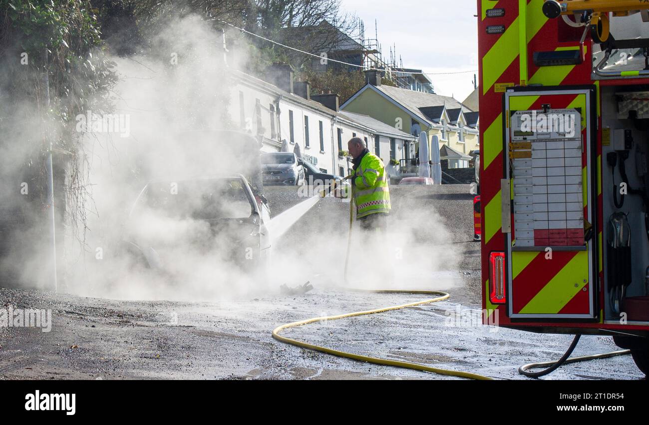 Fire Brigade Ireland putting out car fire Stock Photo - Alamy