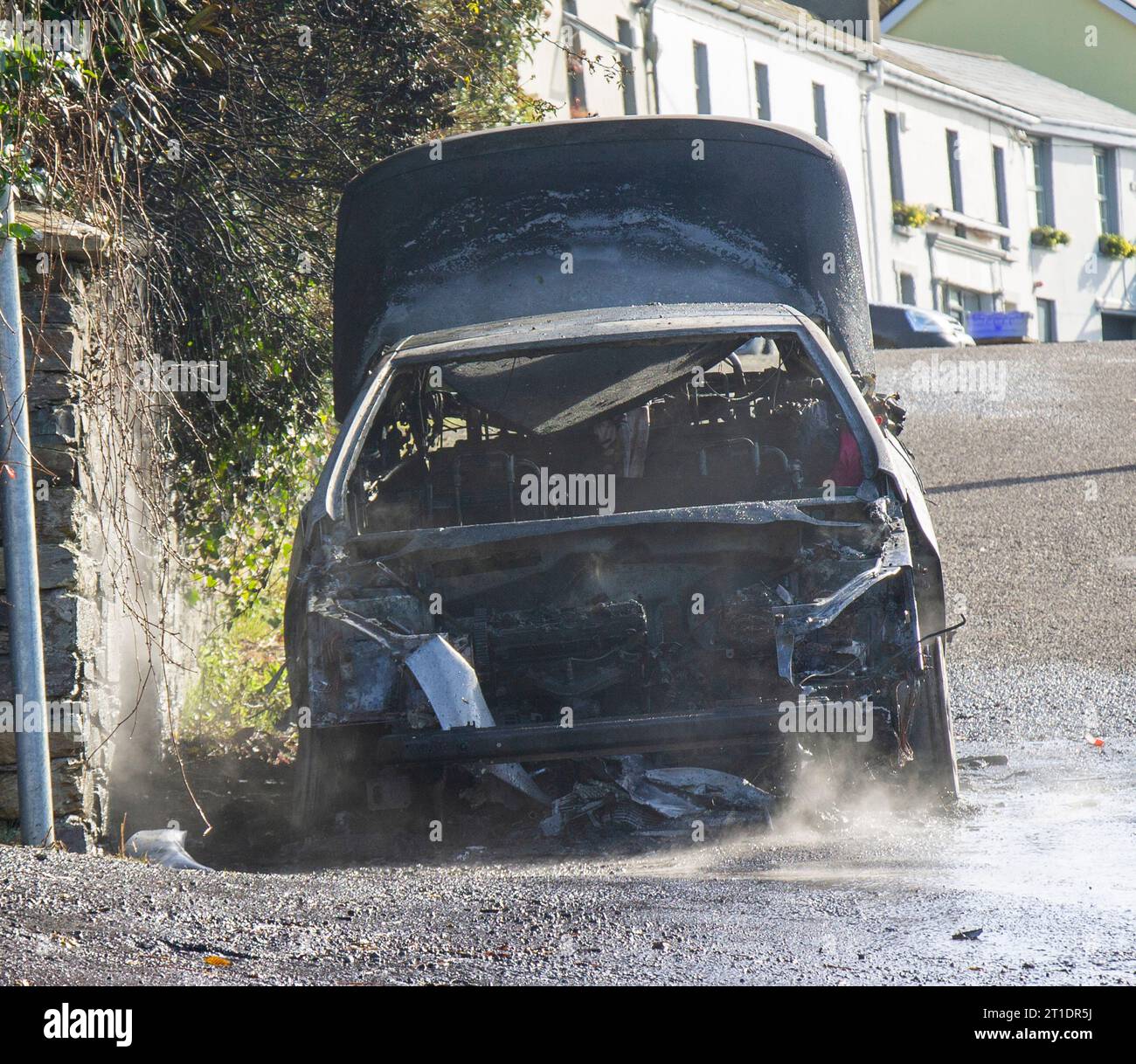 Fire Brigade Ireland putting out car fire Stock Photo - Alamy