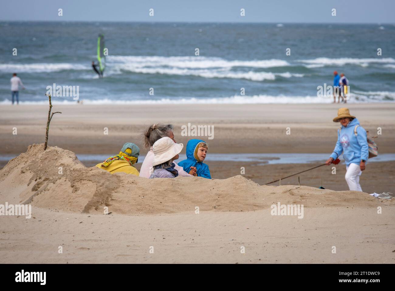 spectators of the Coast Marathon Zeeland on the beach in Oostkapelle on ...