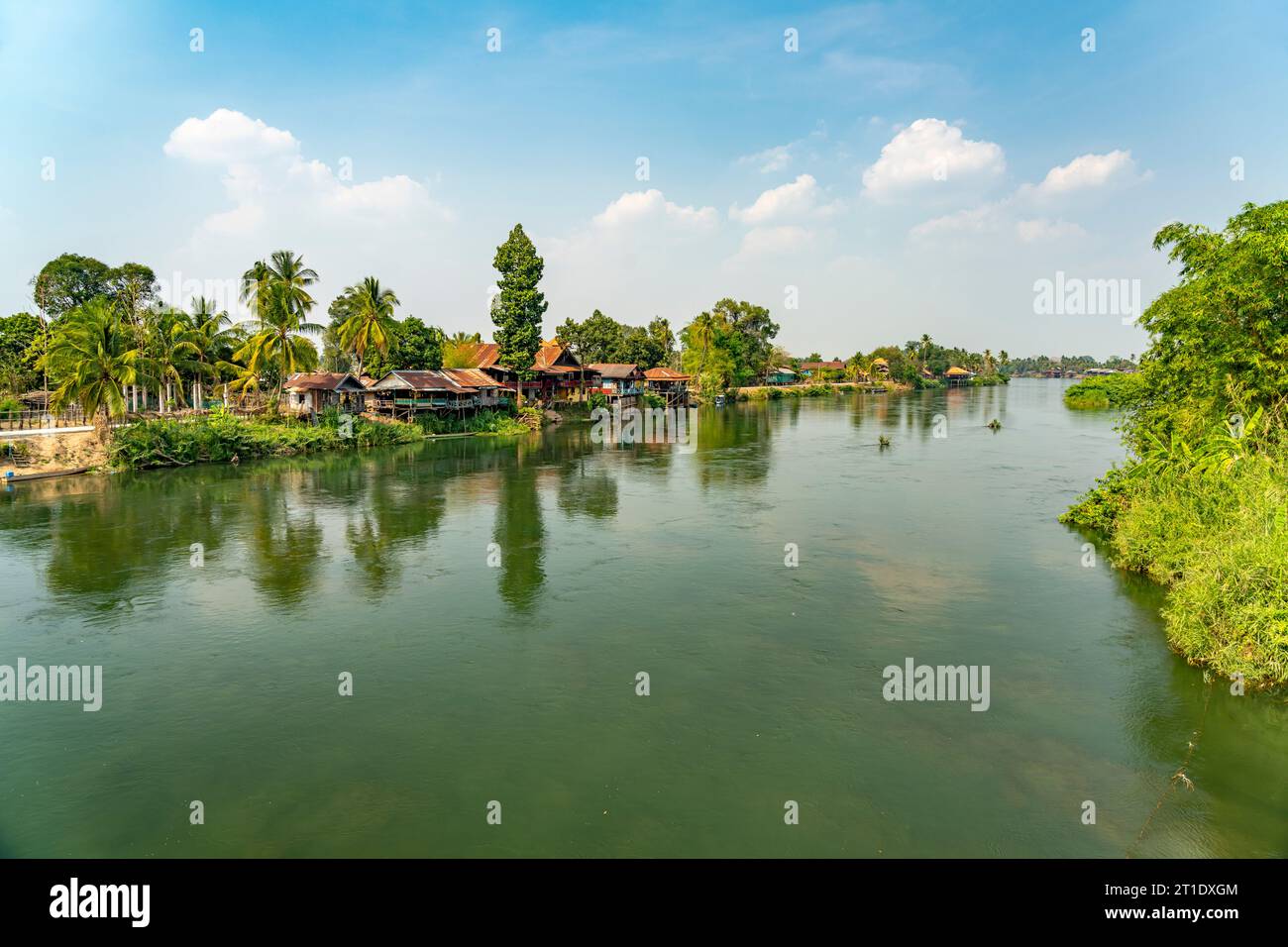 Stilt houses on the Mekong on Don Det Island, Si Phan Don, Champasak ...