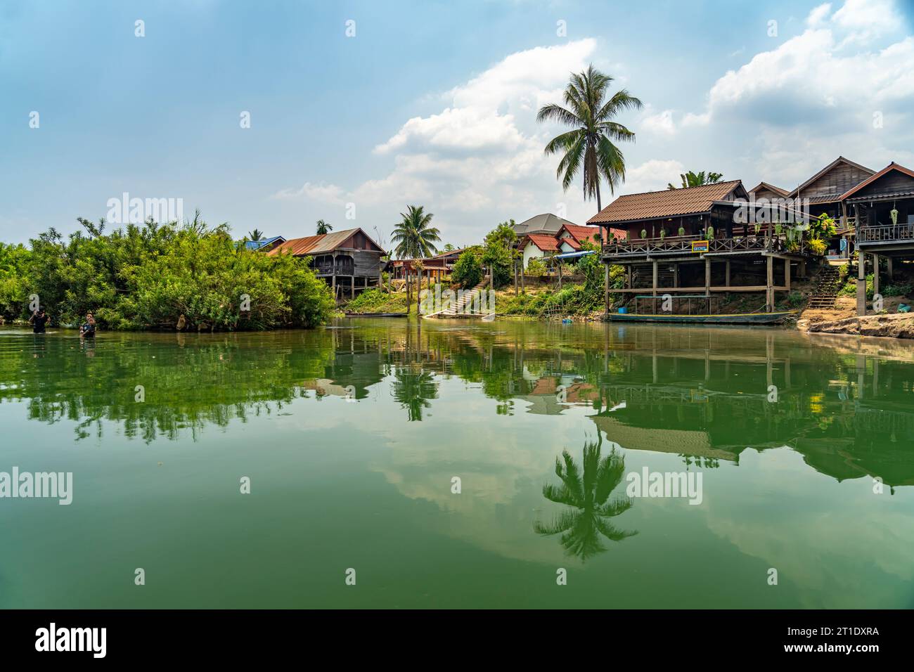 Stilt houses on the Mekong on Don Det Island, Si Phan Don, Champasak ...