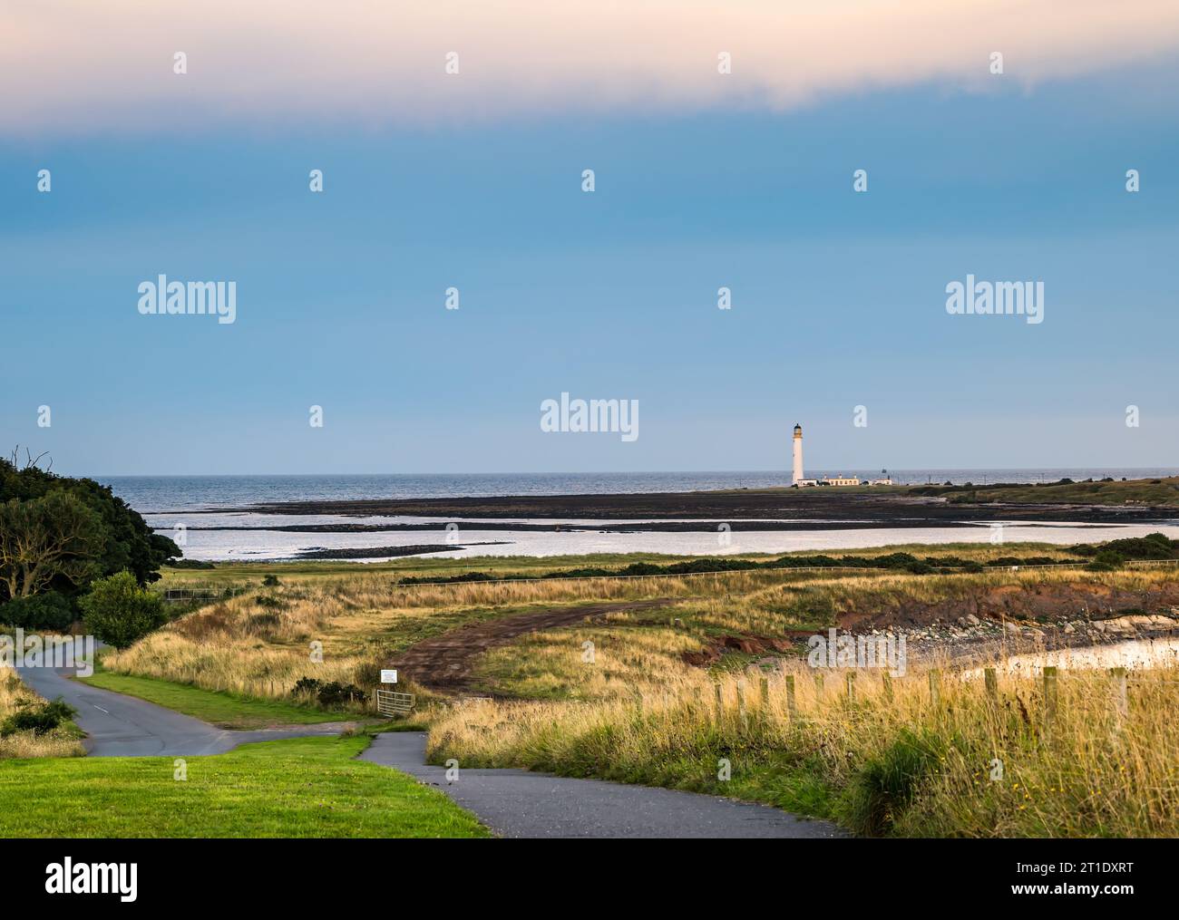 View in distance of Barns Ness lighthouse at dusk, East Lothian ...