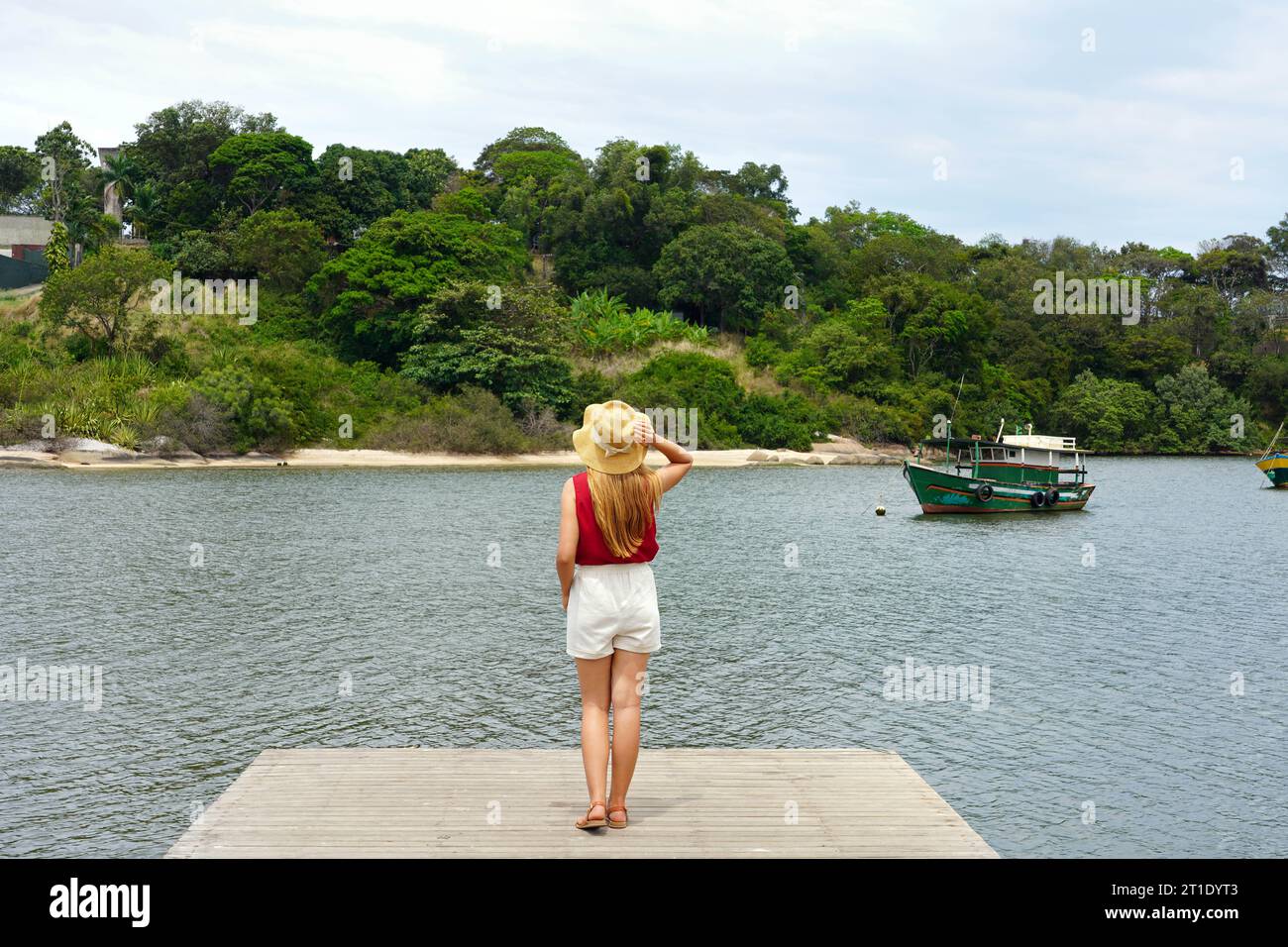 Holidays in Brazil. Full length view of tourist girl on pier in ...