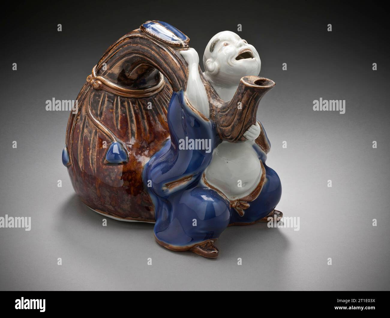 Sake Vessel in the Form of Hotei with his Bag, 19th century Stock Photo ...