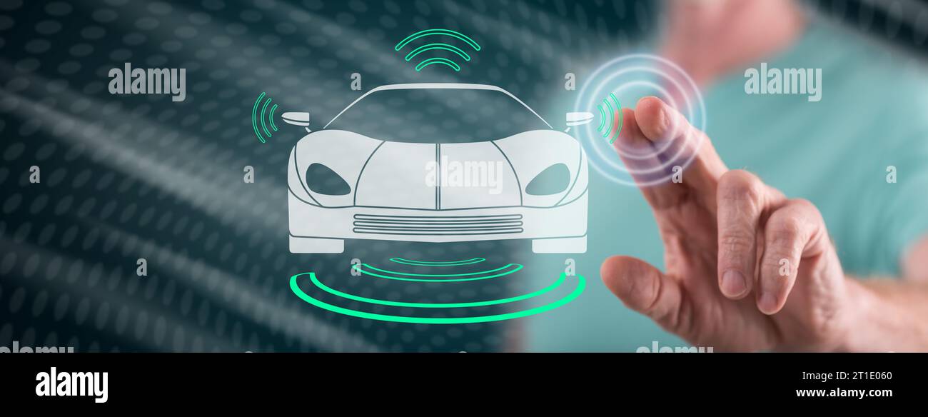 Man touching a smart car concept on a touch screen with his finger ...