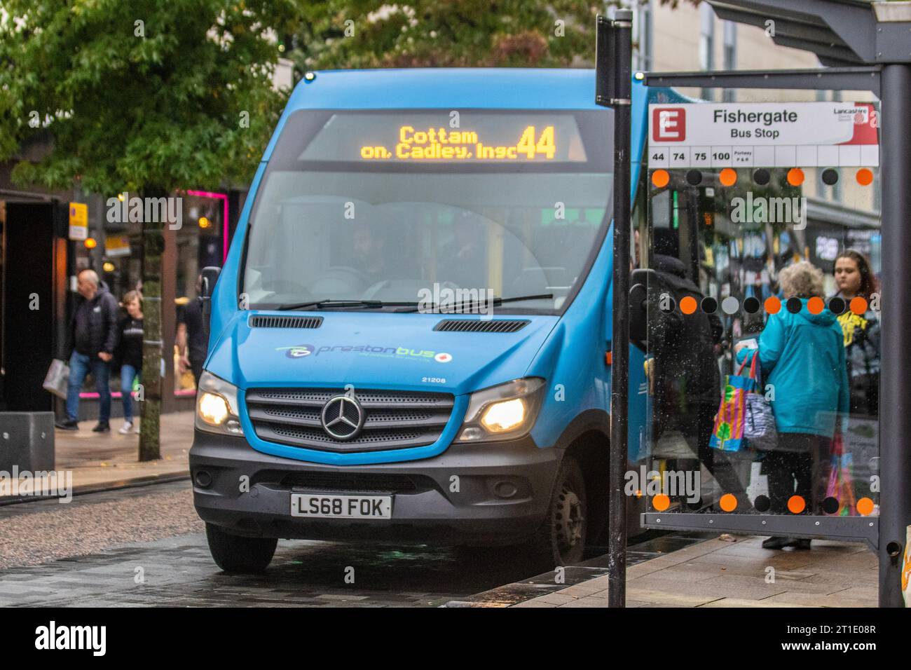 City centre buses in Preston, Lancashire. UK Weather. 13 Oct 2023 Rainy ...
