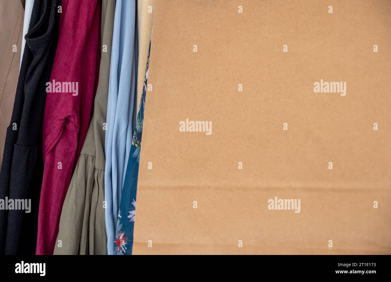 Black friday shopping bag with clothes with clothes hanger inside ...