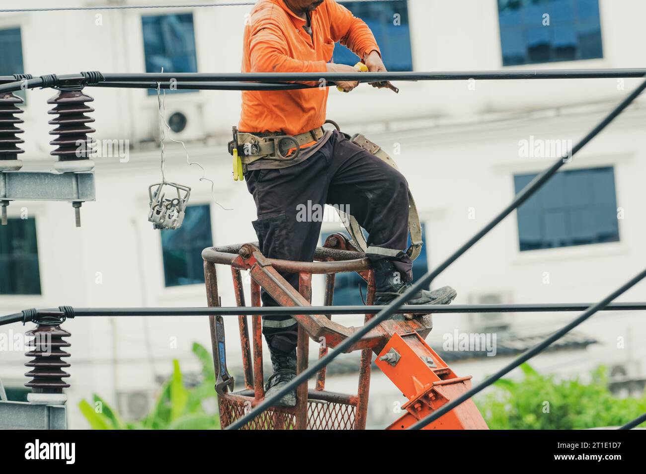 High voltage power line maintenance. Electrician at work. Electrical ...