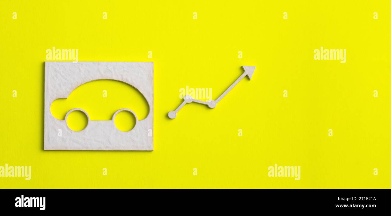 Car value increase - Arrow on yellow background Stock Photo - Alamy