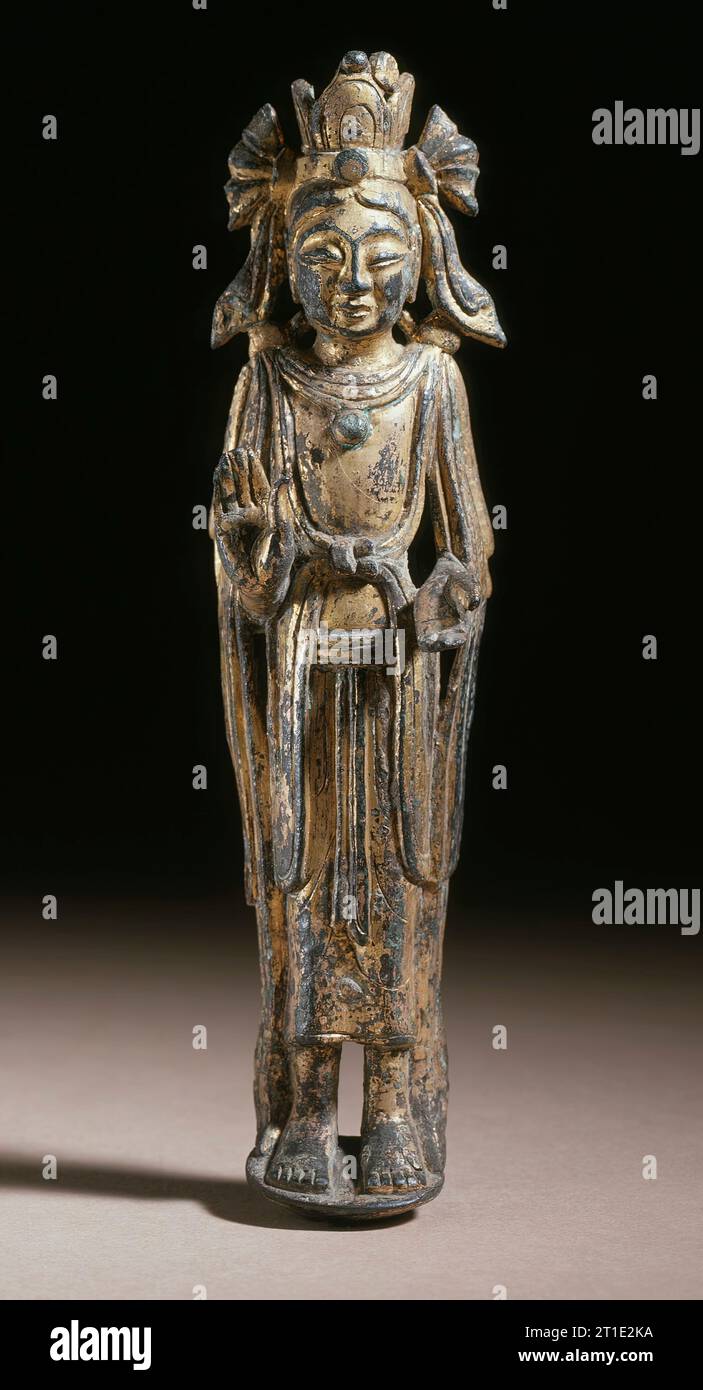 Probably Avalokiteshvara (Guanyin), the Bodhisattva of Mercy, between ...