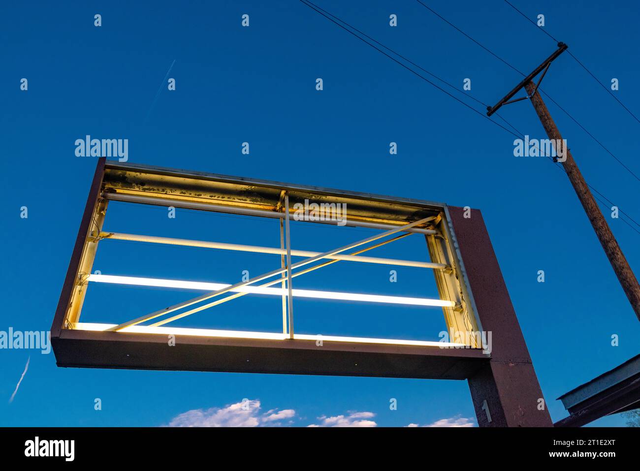 Old and empty roadside sign frame for a former motel in Albuquerque ...