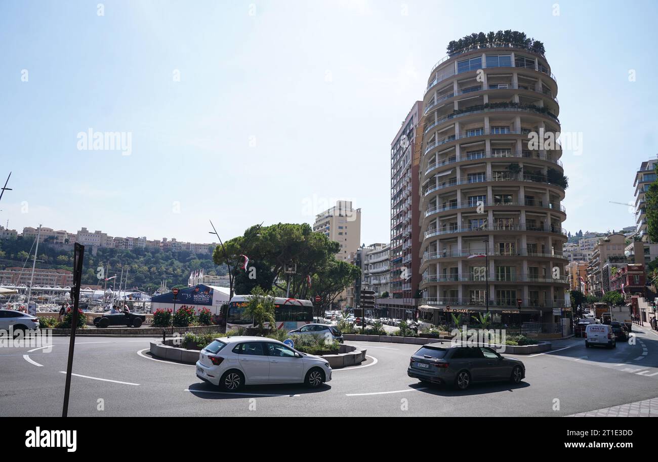 Traffic goes through St Devote corner on the Monaco Grand Prix circuit ...