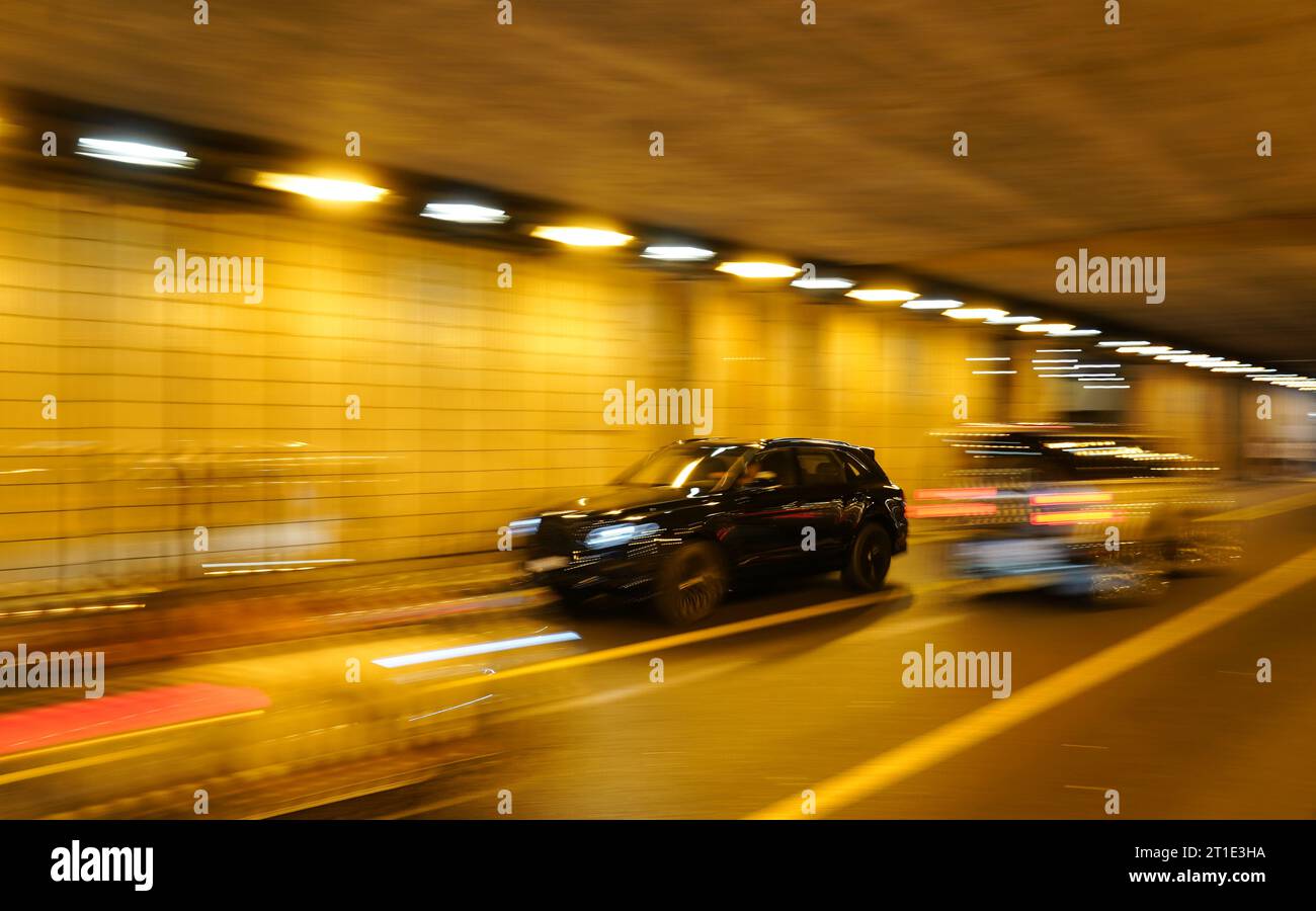 Traffic goes through the Tunnel on the Monaco Grand Prix circuit in it ...