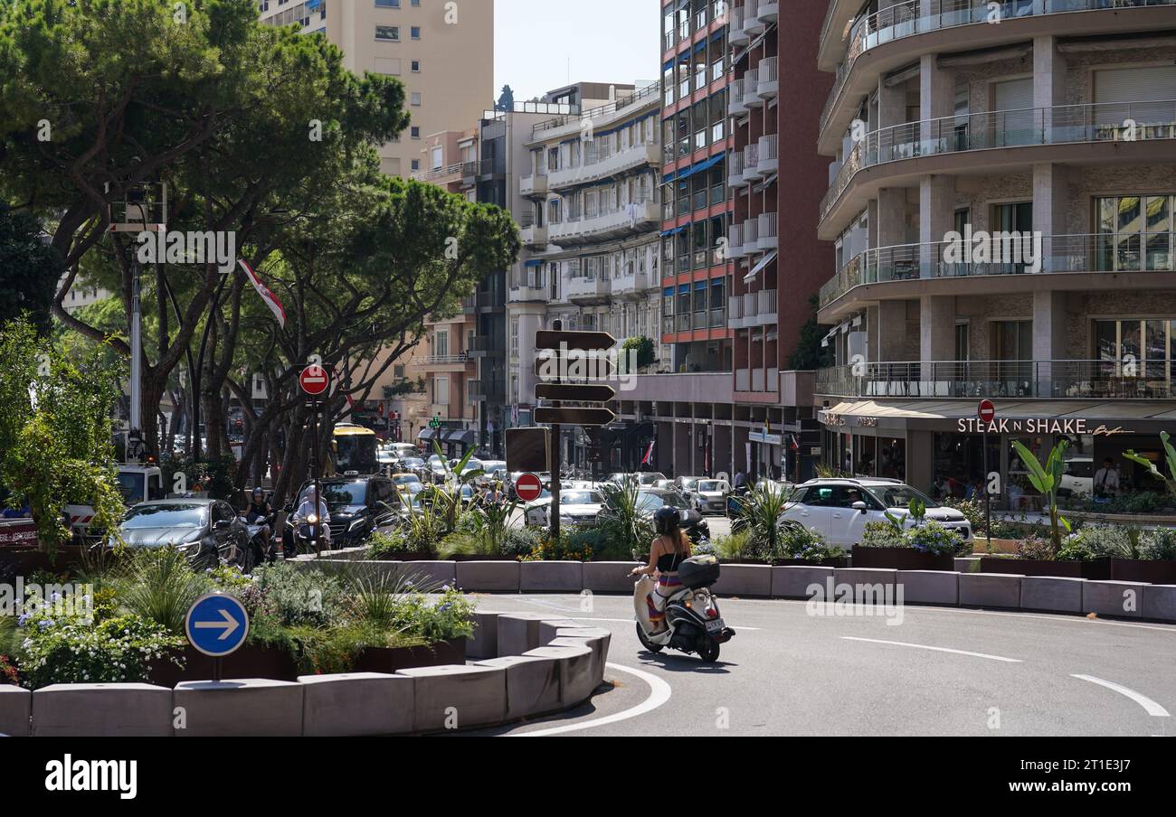 Traffic goes through St Devote corner on the Monaco Grand Prix circuit ...
