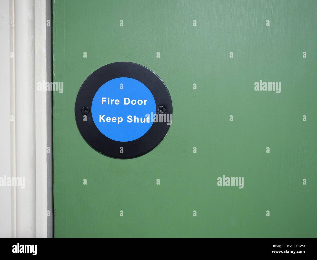 fire door keep shut sign on a hotel room door Stock Photo - Alamy
