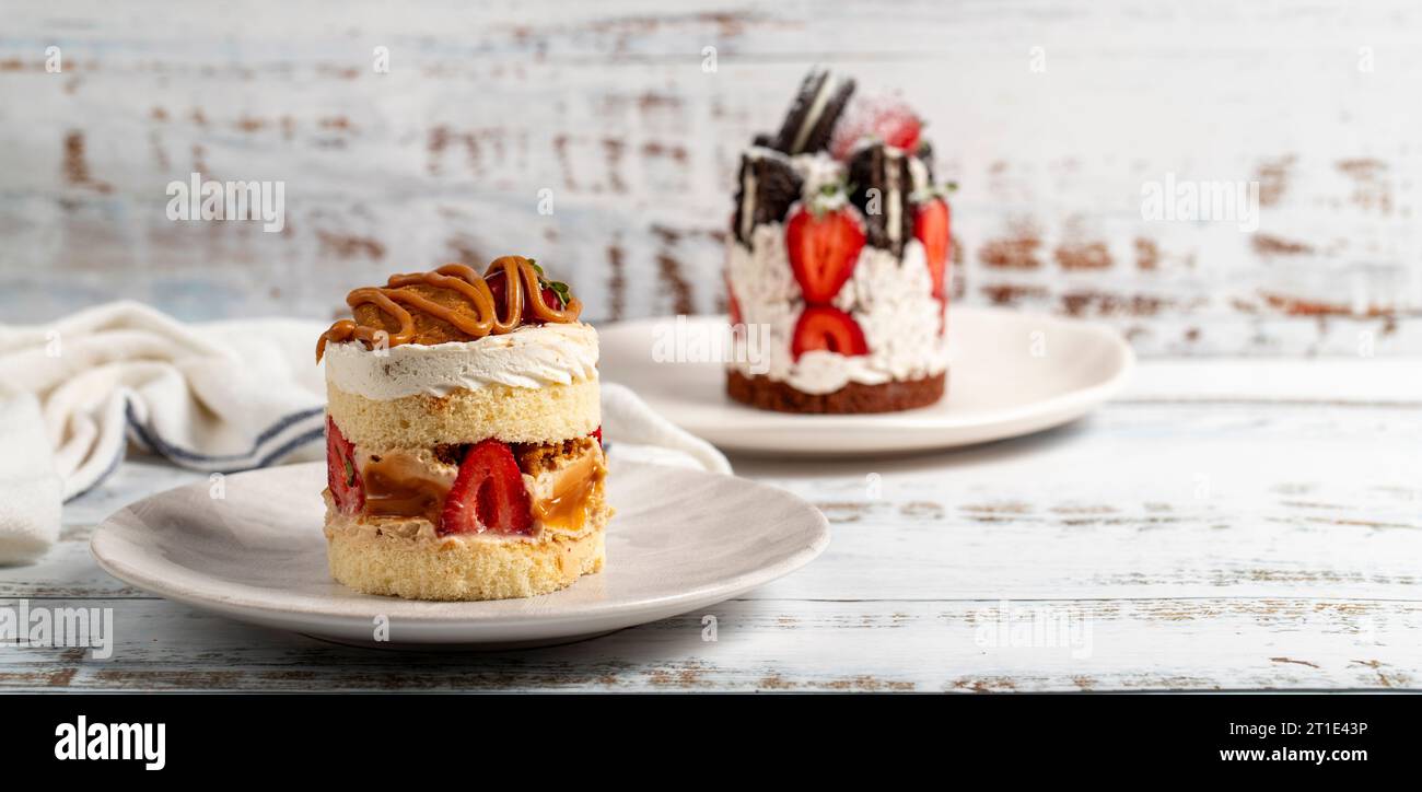 Types of cakes. Fresh cakes with strawberries on a plate Stock Photo ...