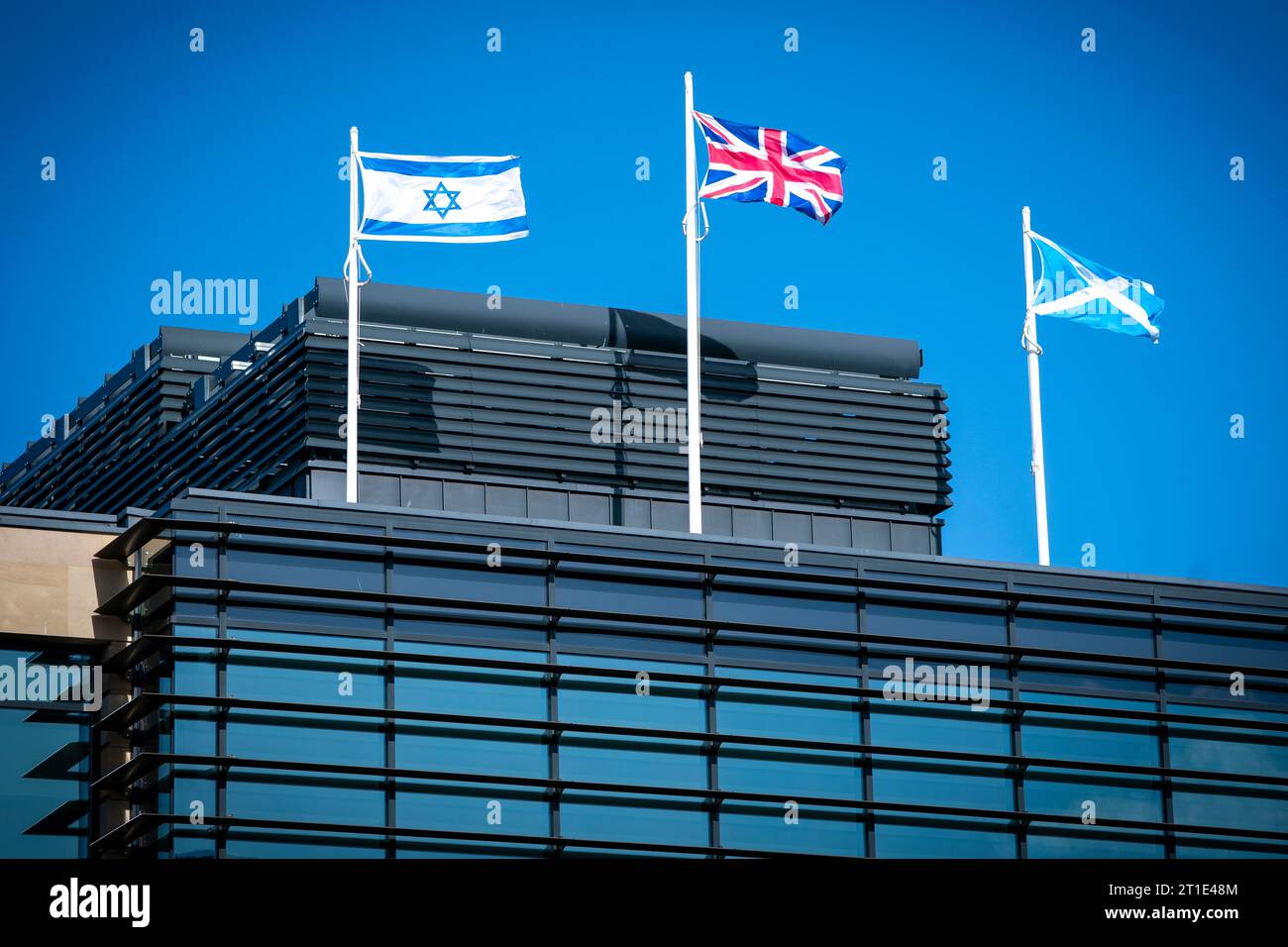 The flag of Israel, the Union flag and the Saltire fly above the UK ...