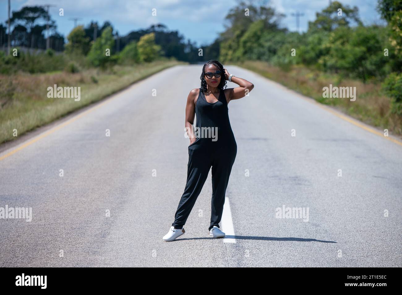 Beautiful woman on road hi-res stock photography and images - Alamy