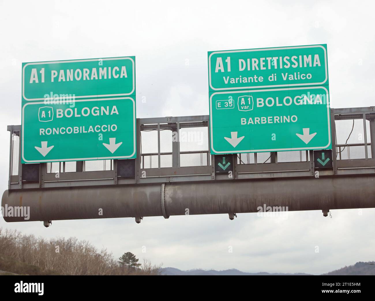 road sign indicating the crossroads in central Italy with two ...