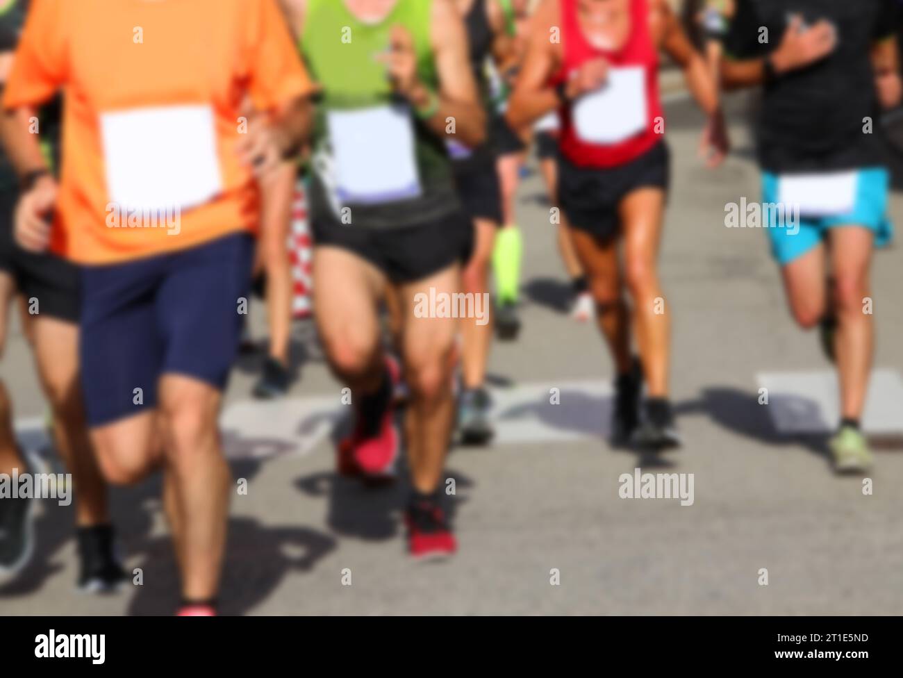 intentionally blurred photograph of unrecognizable runners ideal as a ...