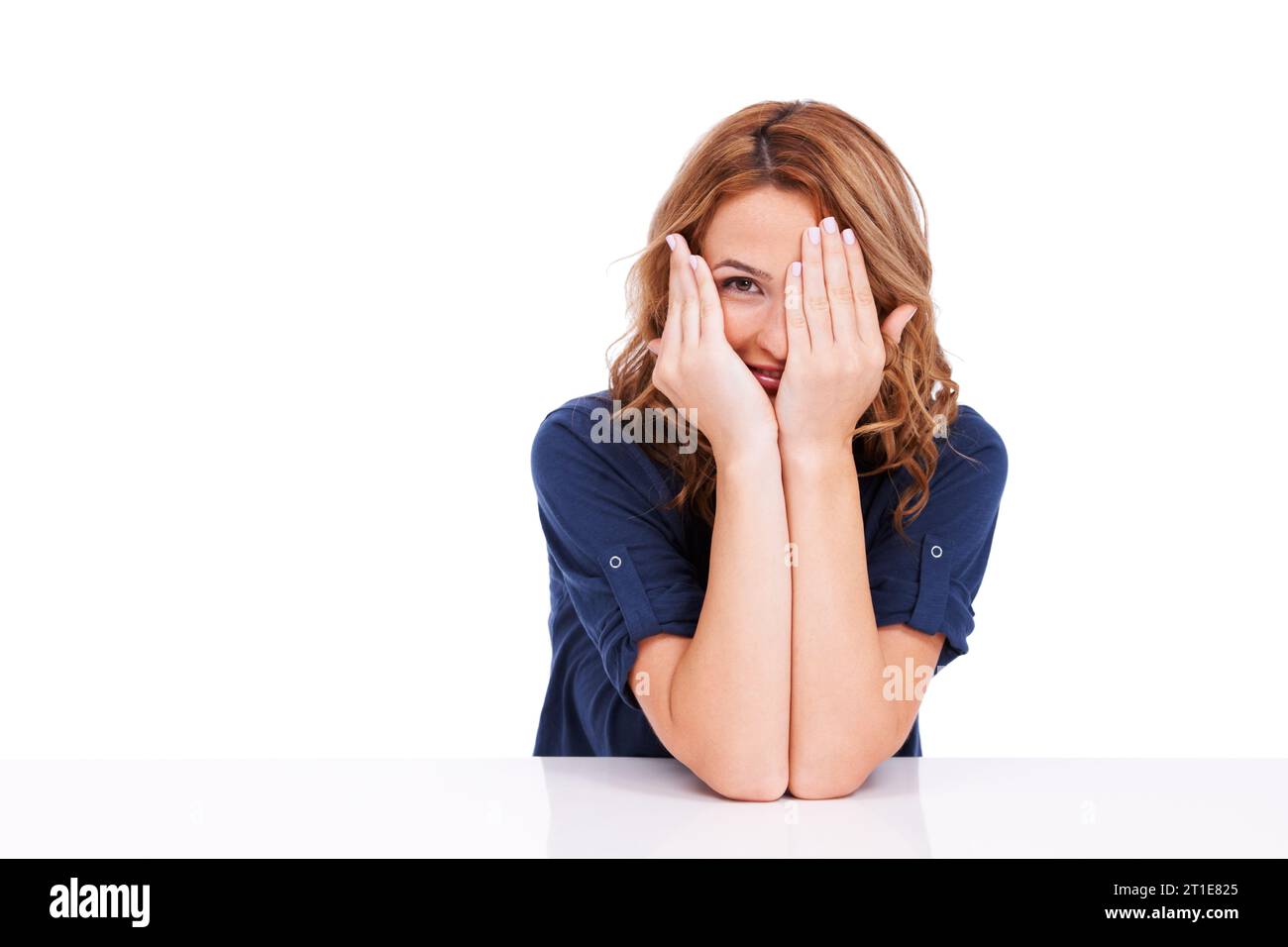 Shy girl covering up face hi-res stock photography and images - Alamy