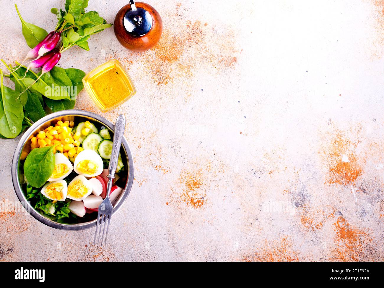 Bowl of vegetarian salad with boiled eggs- radishes- cucumbers- corn salad Stock Photo - Alamy
