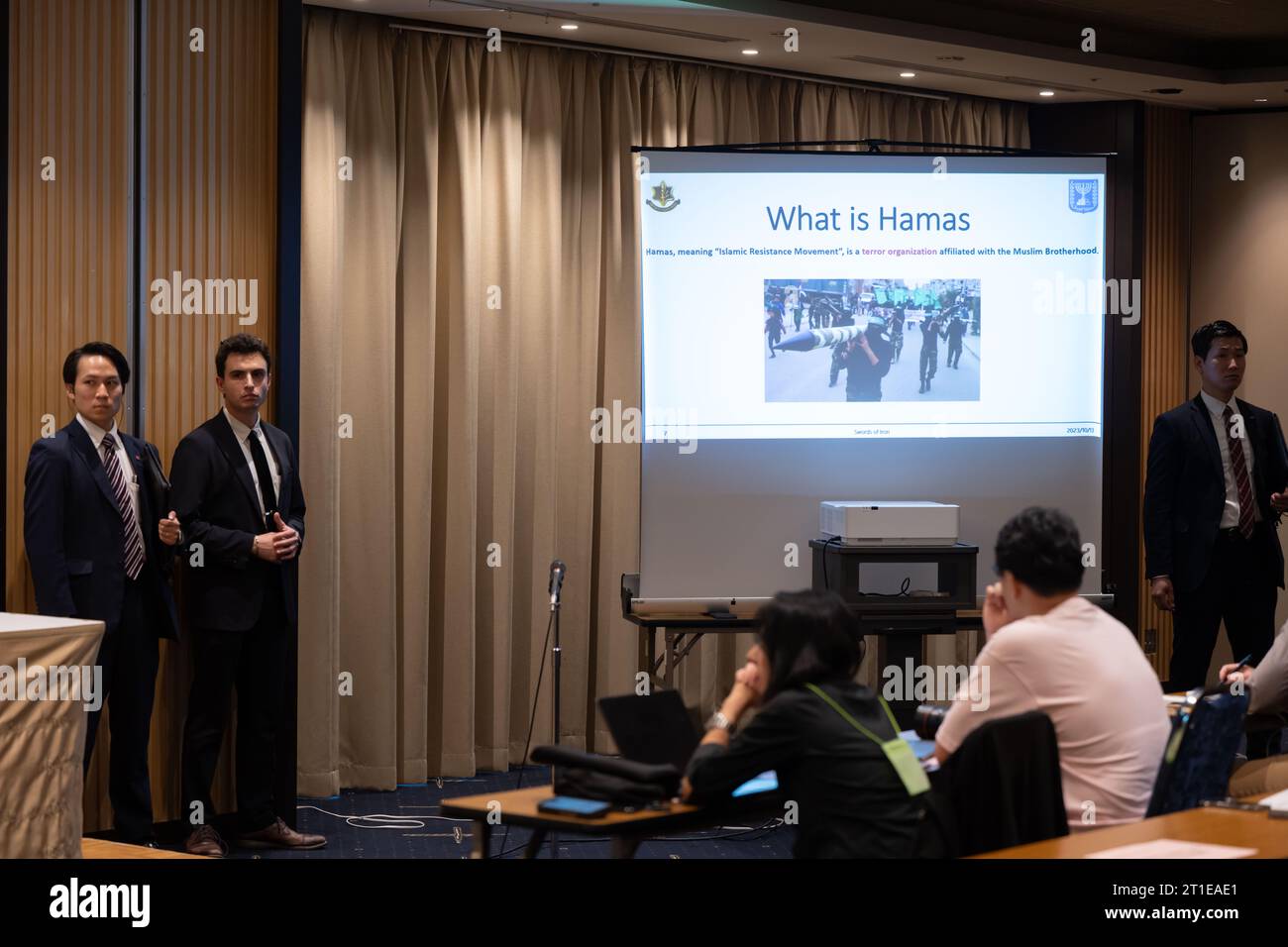 Tokyo, Japan. 13th Oct, 2023. Bodyguards watch the room during a ...