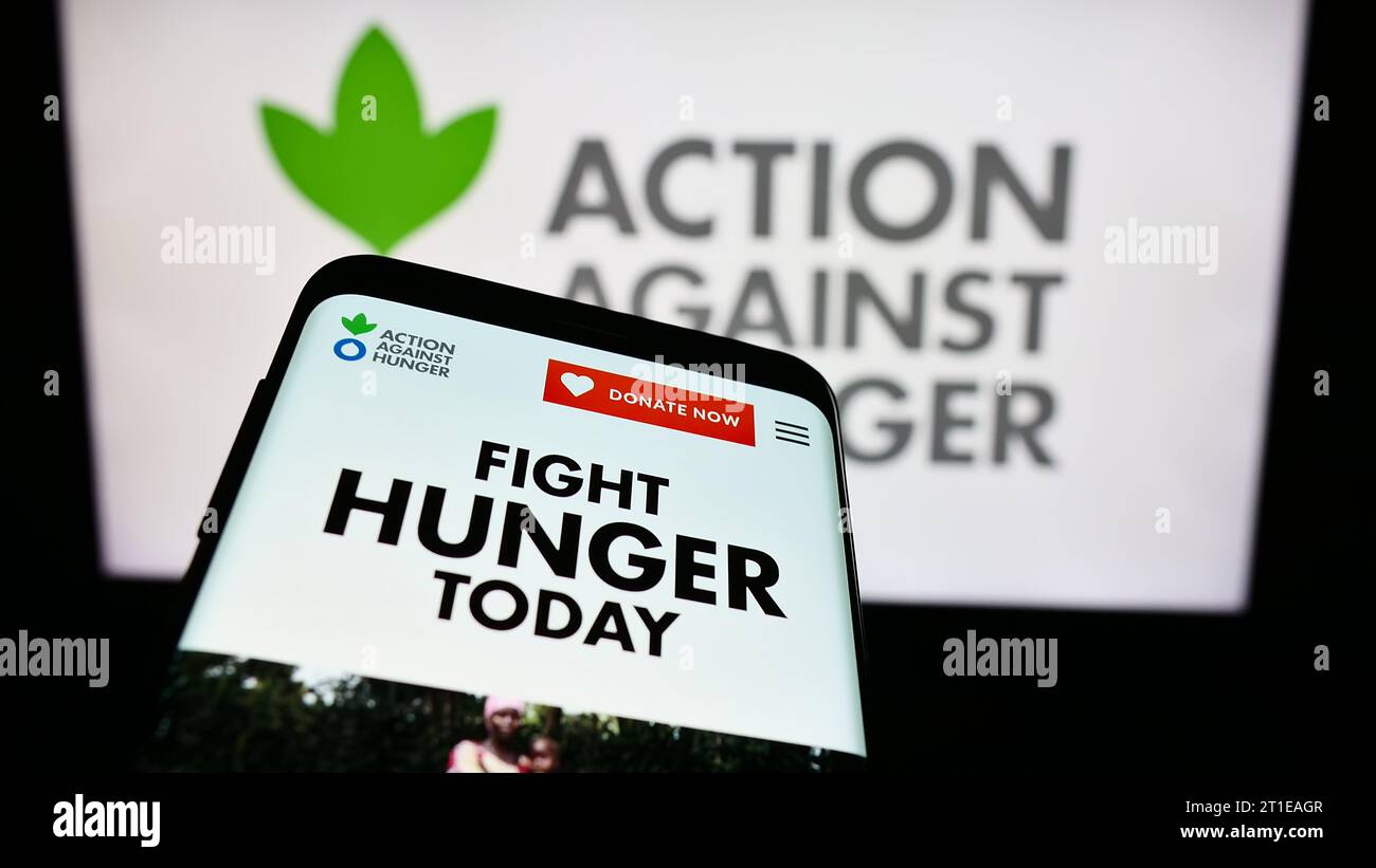 Mobile phone with website of humanitarian organization Action Against ...