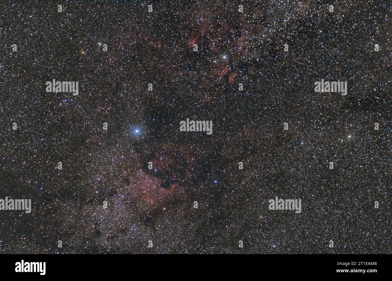 Milky Way in the constellation of Cygnus and the North America nebula. Stars Deneb and Caph ...