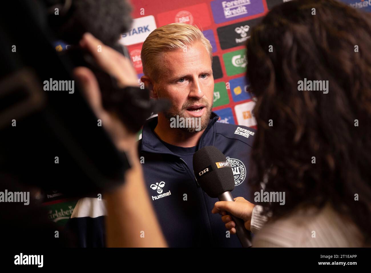 Denmark goalkeeper Kasper Schmeichel speaks to journalists after the ...