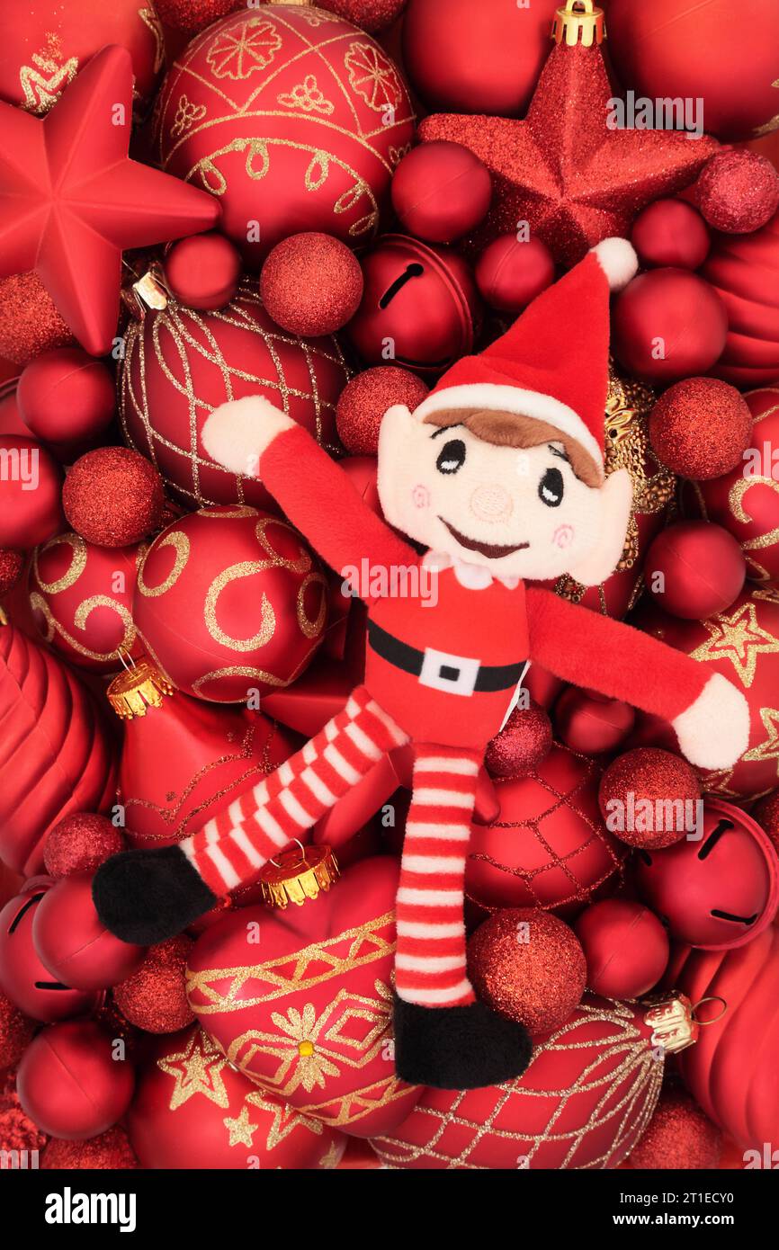 Christmas elf toy with red gold bauble tree decorations abstract ...