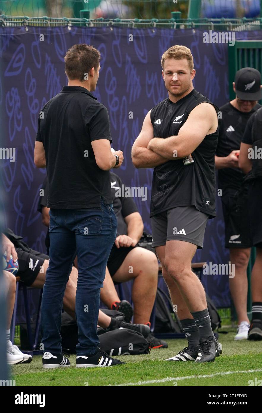 New Zealand captain Sam Cane (right) speaks to former player and ...