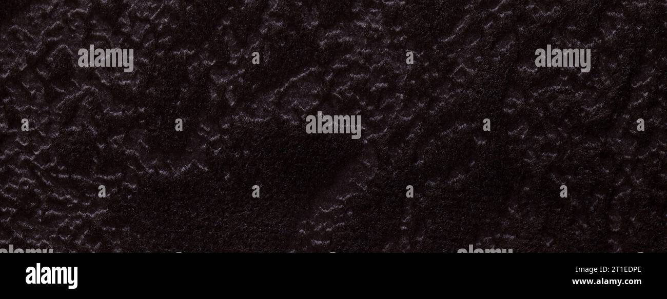 Dark brown background from a soft upholstery textile material, closeup ...