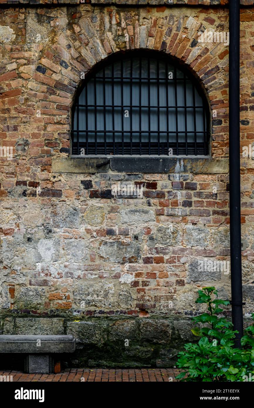 Old prison window with brick walls Stock Photo - Alamy