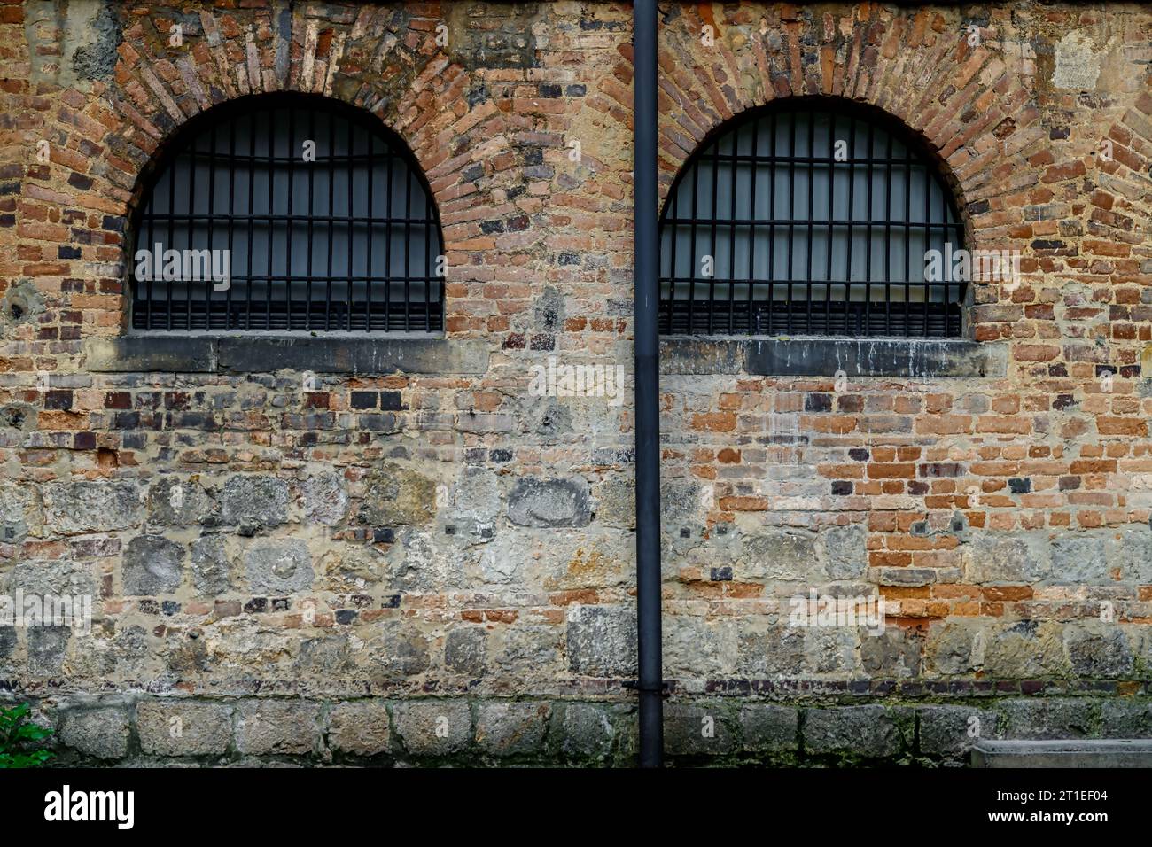 Old prison windows with brick walls Stock Photo - Alamy