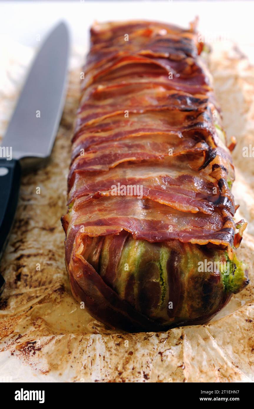 Pea mousse in a crispy bacon coat baked in the oven Stock Photo - Alamy