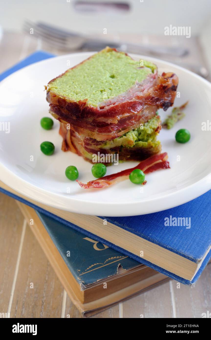 Pea mousse loaf in crispy bacon coating baked in the oven Stock Photo ...