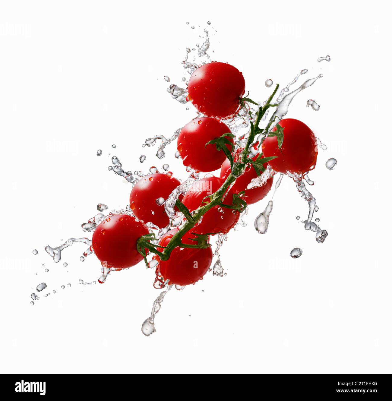 Cherry tomatoes making a splash Stock Photo - Alamy