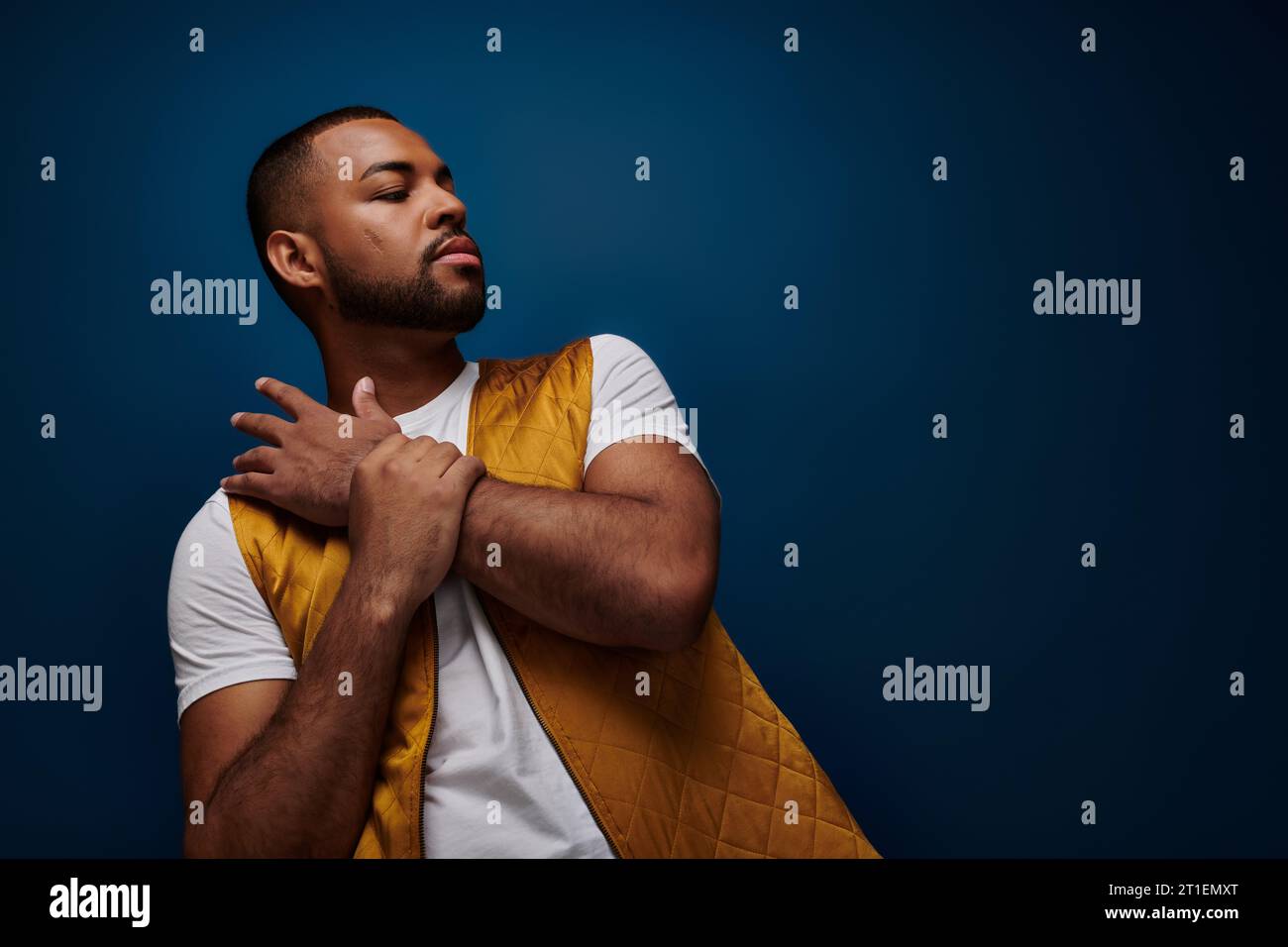 Hands on chest pose hi-res stock photography and images - Alamy