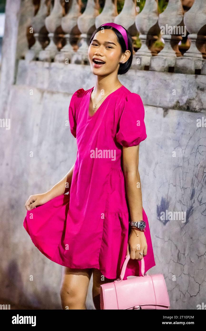 A Young Beautiful Filipino Girl Stylishly Dressed Poses For The Camera Outside Archdiocesan