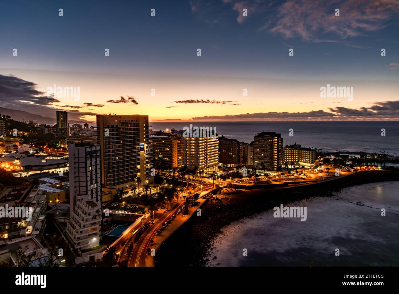 The northern part of Tenerife The city of Puerto de la Cruz at night ...