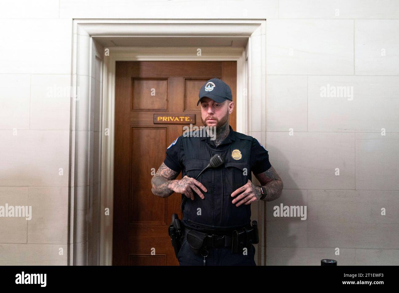 A U.S. Capitol police officer guards one of the doors where the House ...