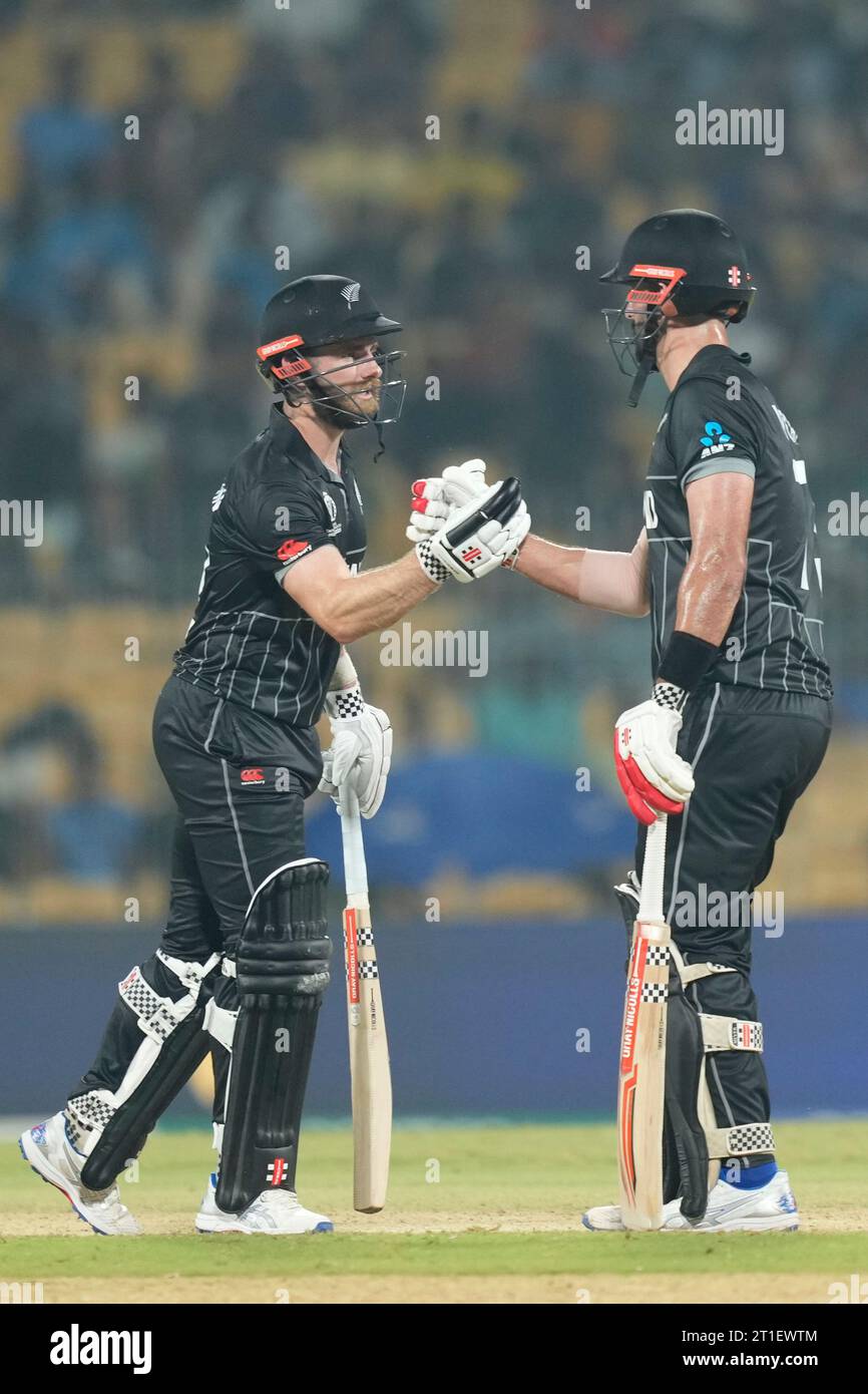 New Zealand's Daryl Mitchell, right, celebrates his fifty runs with New ...