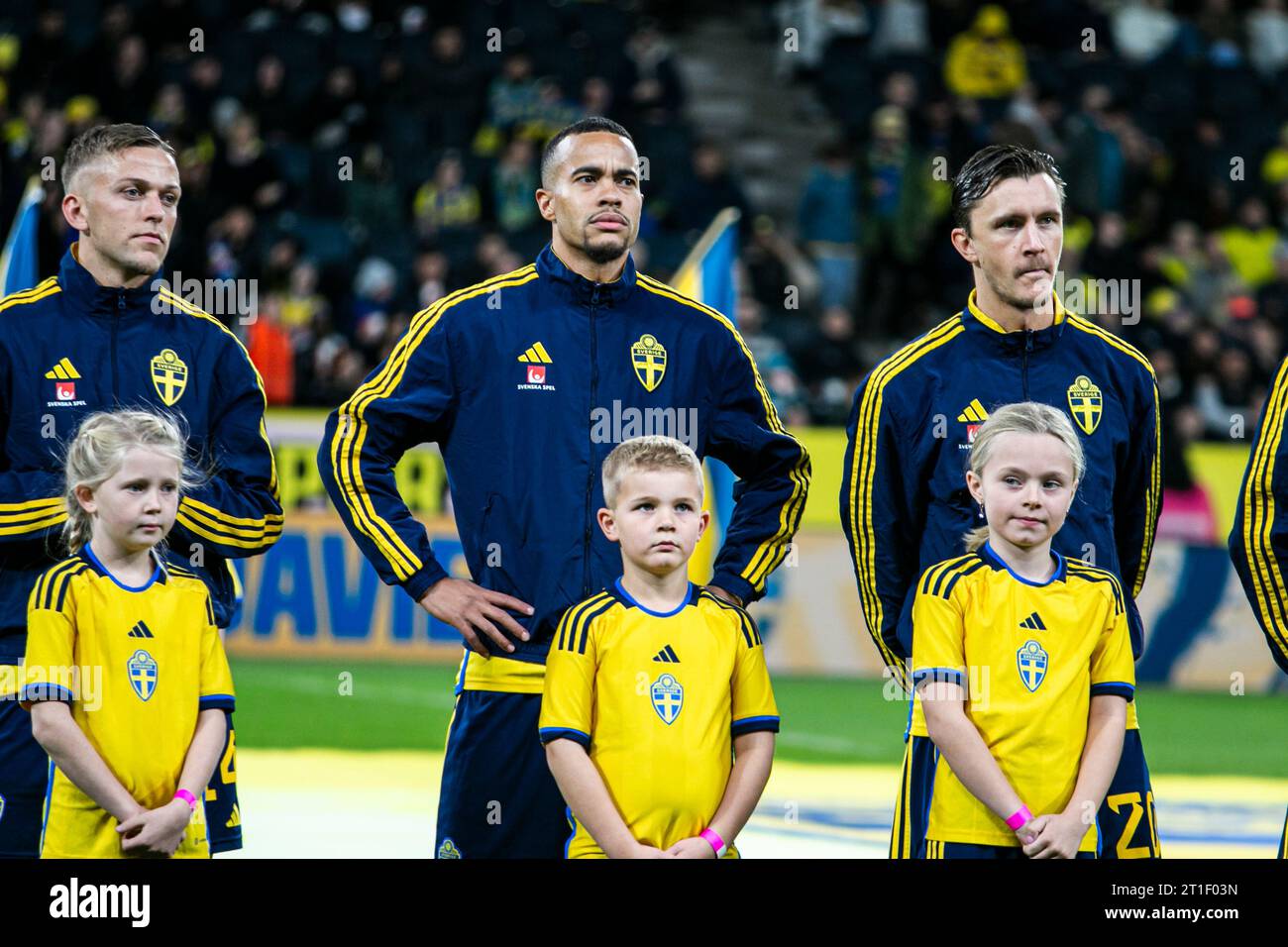 Stockholm, Sweden. 12th Oct, 2023. Robin Quaison (C) and Kristoffer ...
